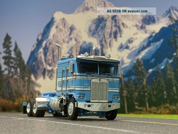 1/64 DCP BABY BLUE/WHITE KENWORTH K100 FLAT TOP LONG FRAME | #40611315